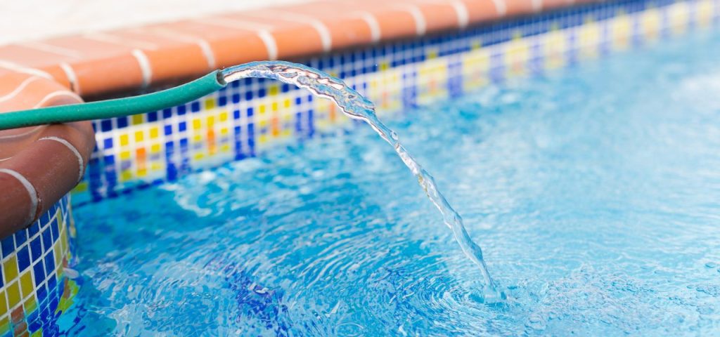 Essential Tips for Maintaining a Sparkling Pool Year-Round - Rank Help Pro